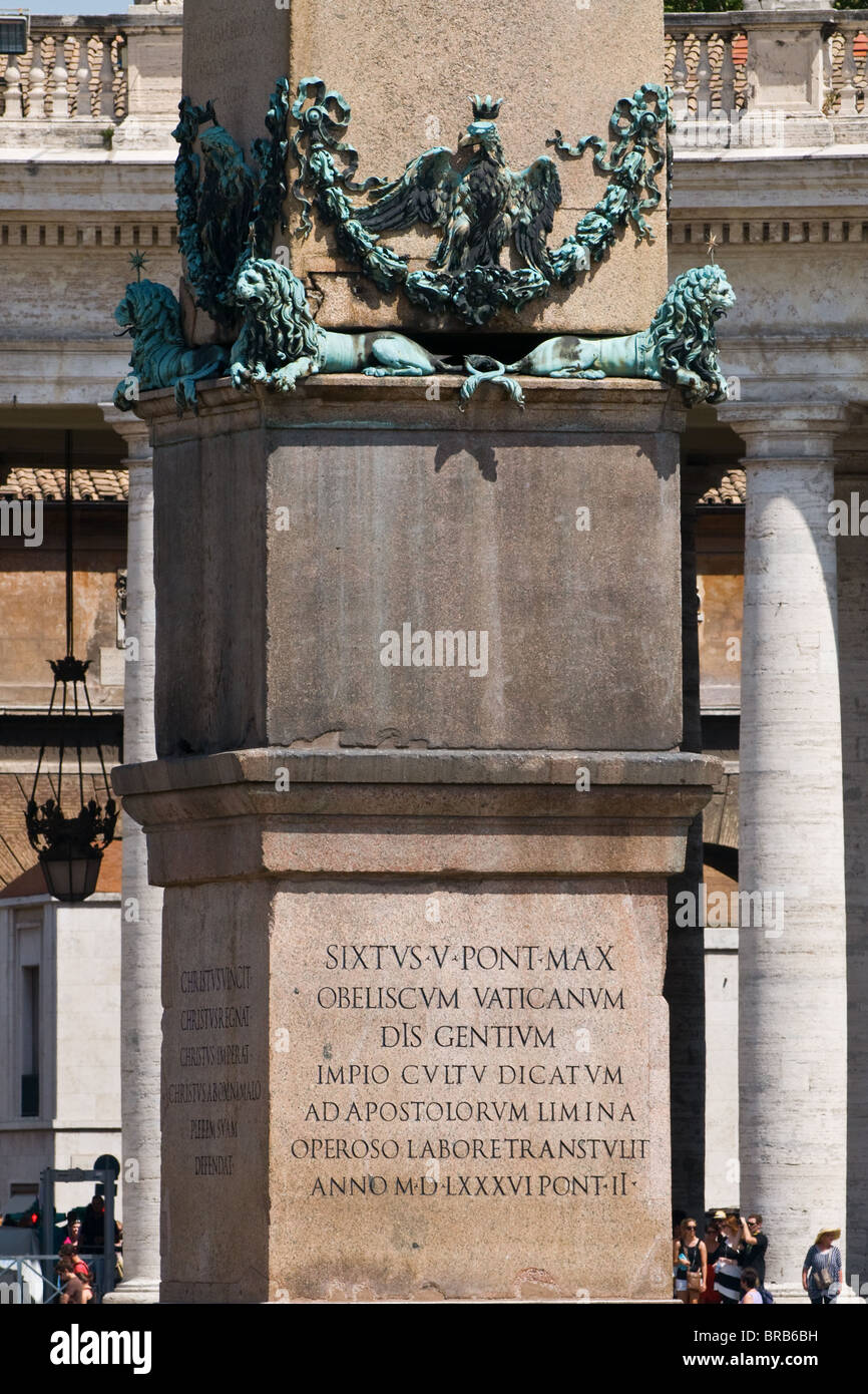 Writing on a monument (Egyptian Obelisk) at Saint Peter's Square ...