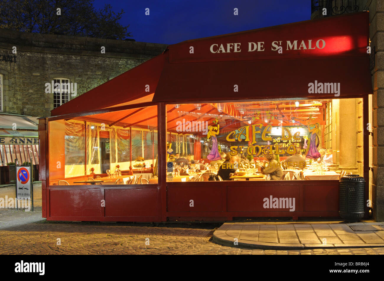 A lit restaurant at night Stock Photo - Alamy