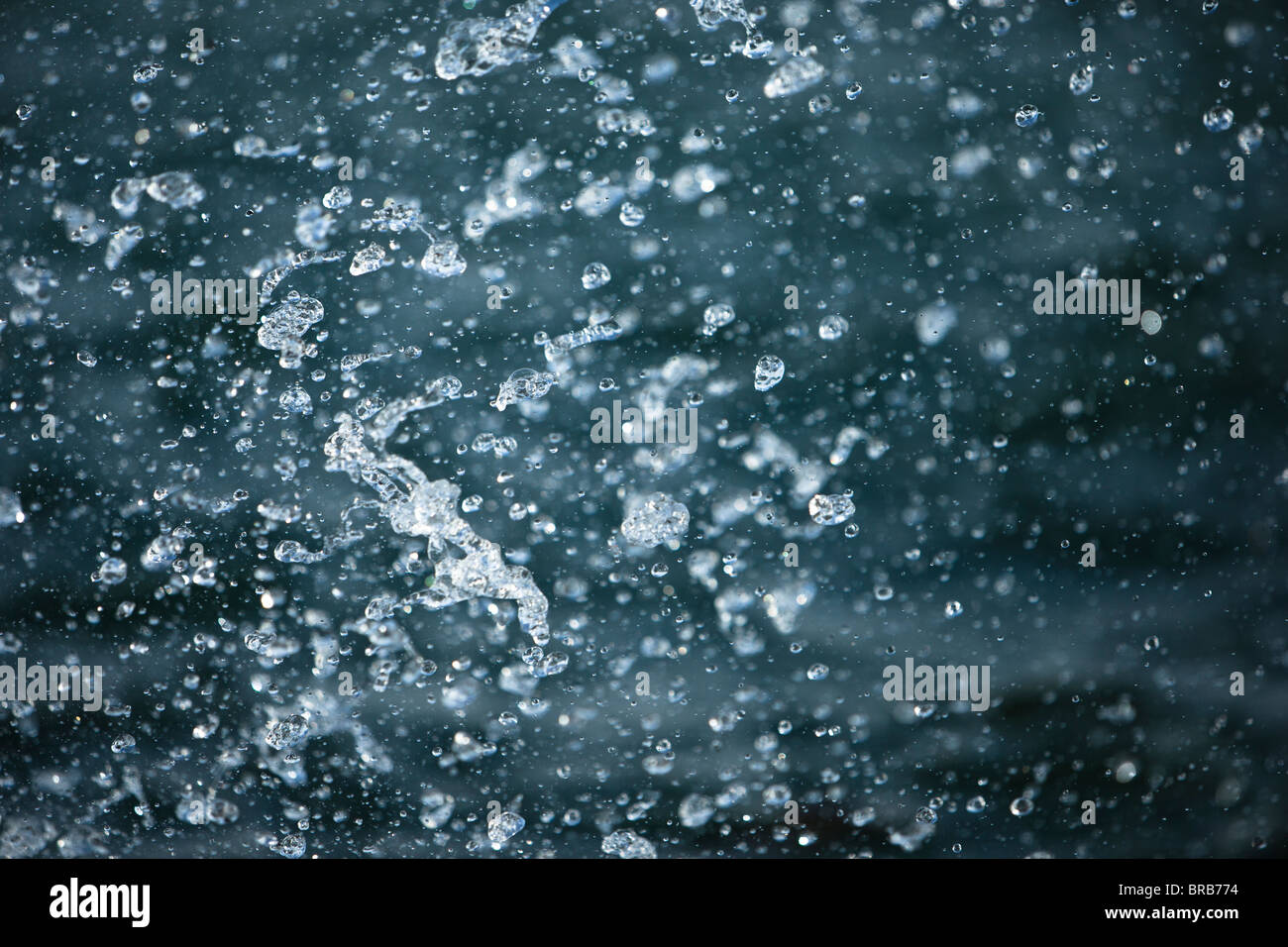 Frozen water droplets and water splashing Stock Photo - Alamy