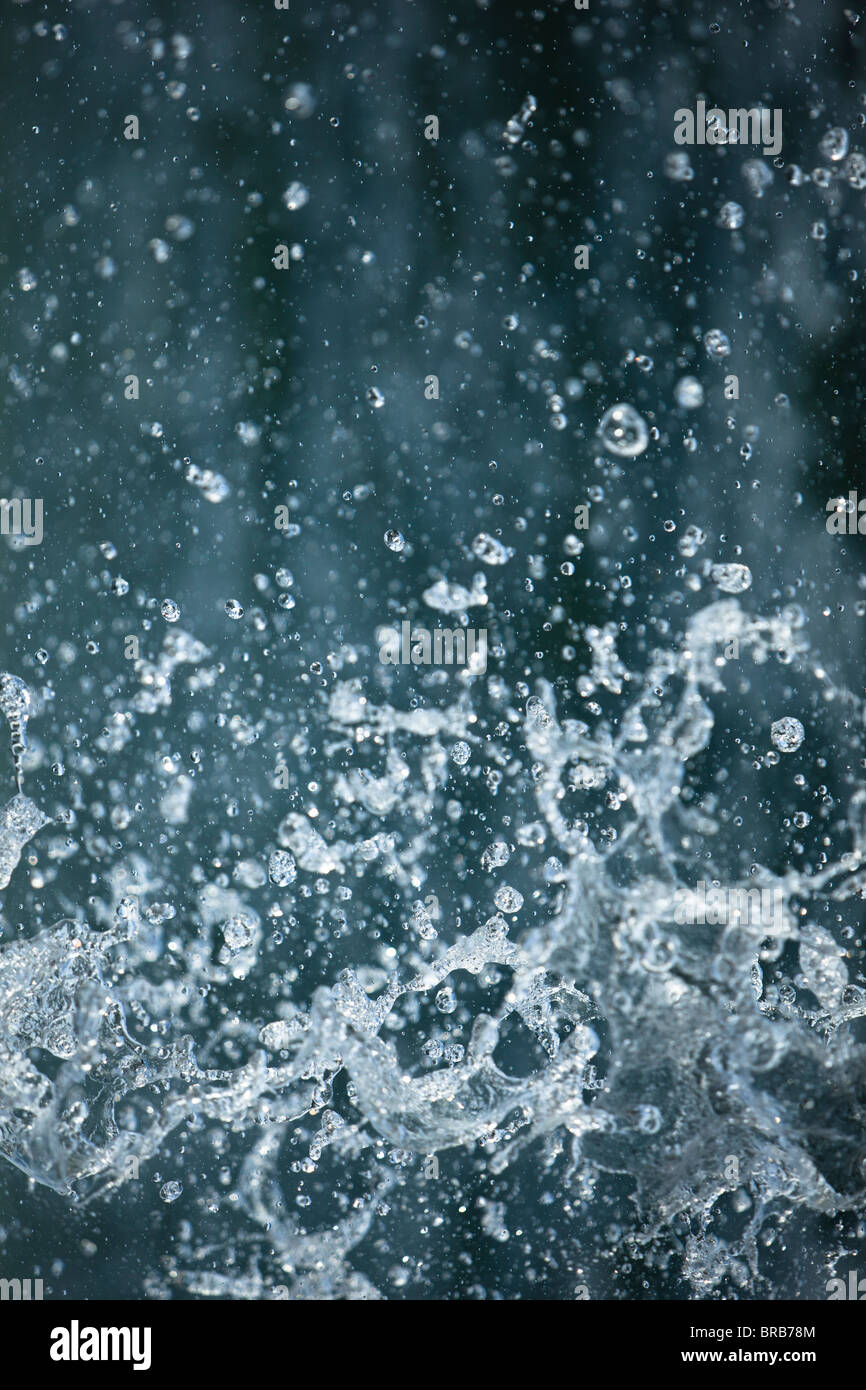 Frozen water droplets and water splashing Stock Photo - Alamy