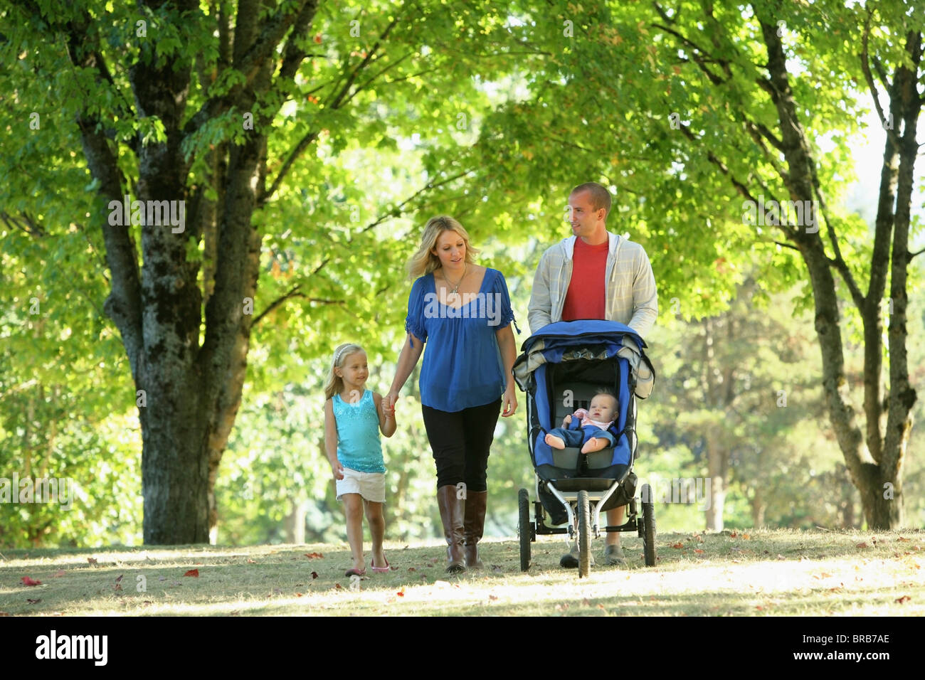 A Family Walking Together Outdoors Stock Photo - Alamy