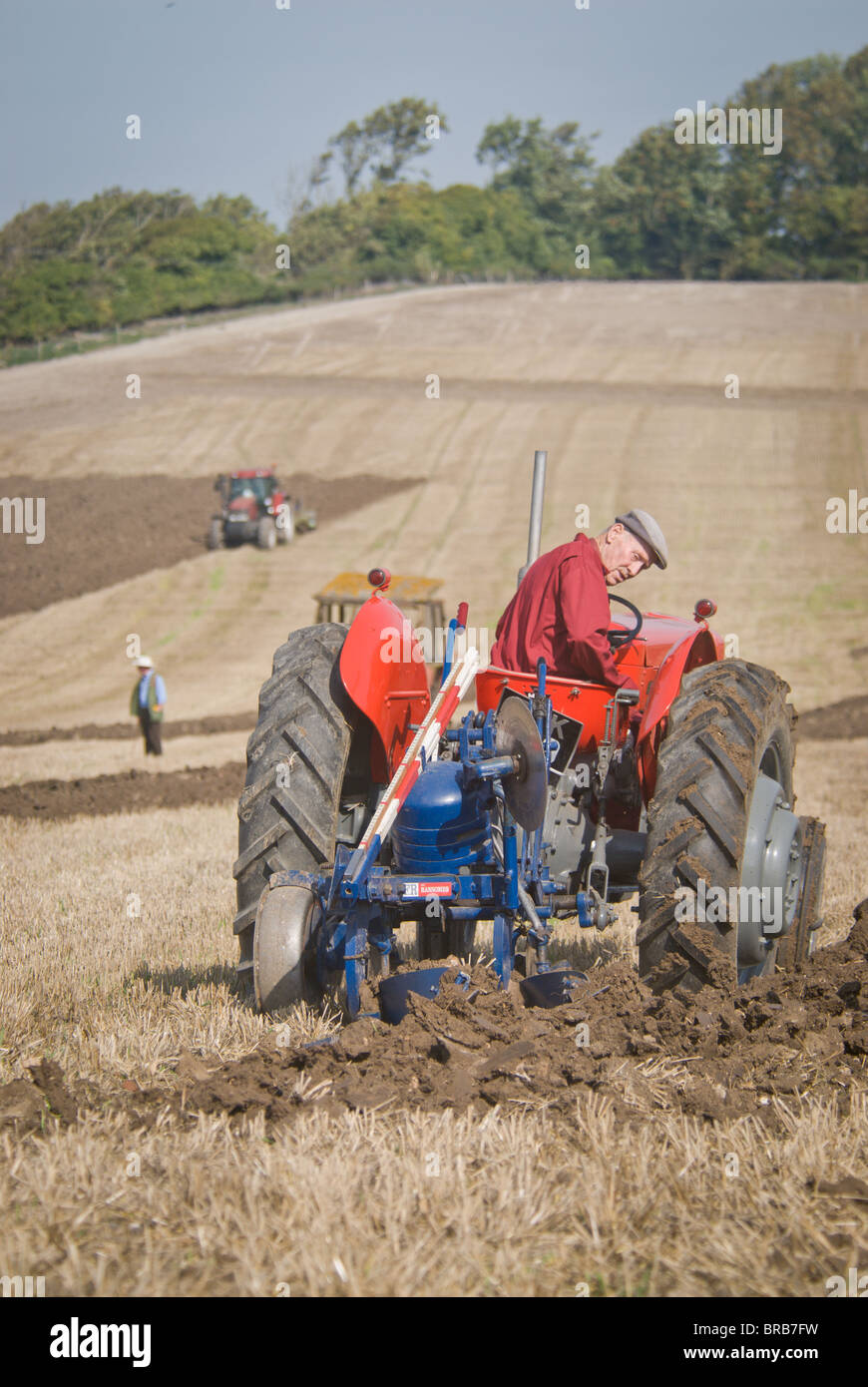 Old farmer ploughing furrows Stock Photo - Alamy