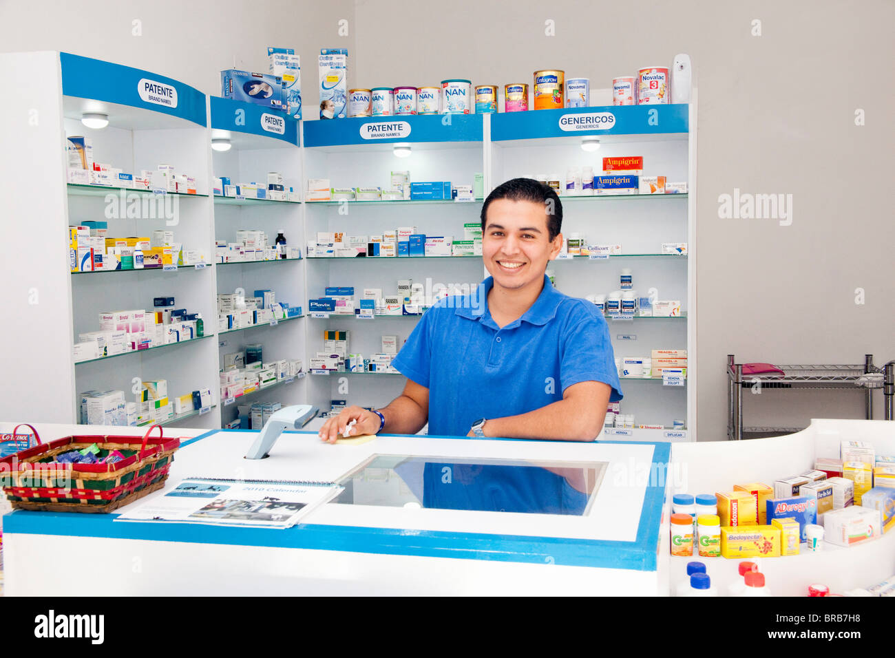 latino pharmacist at counter Stock Photo - Alamy