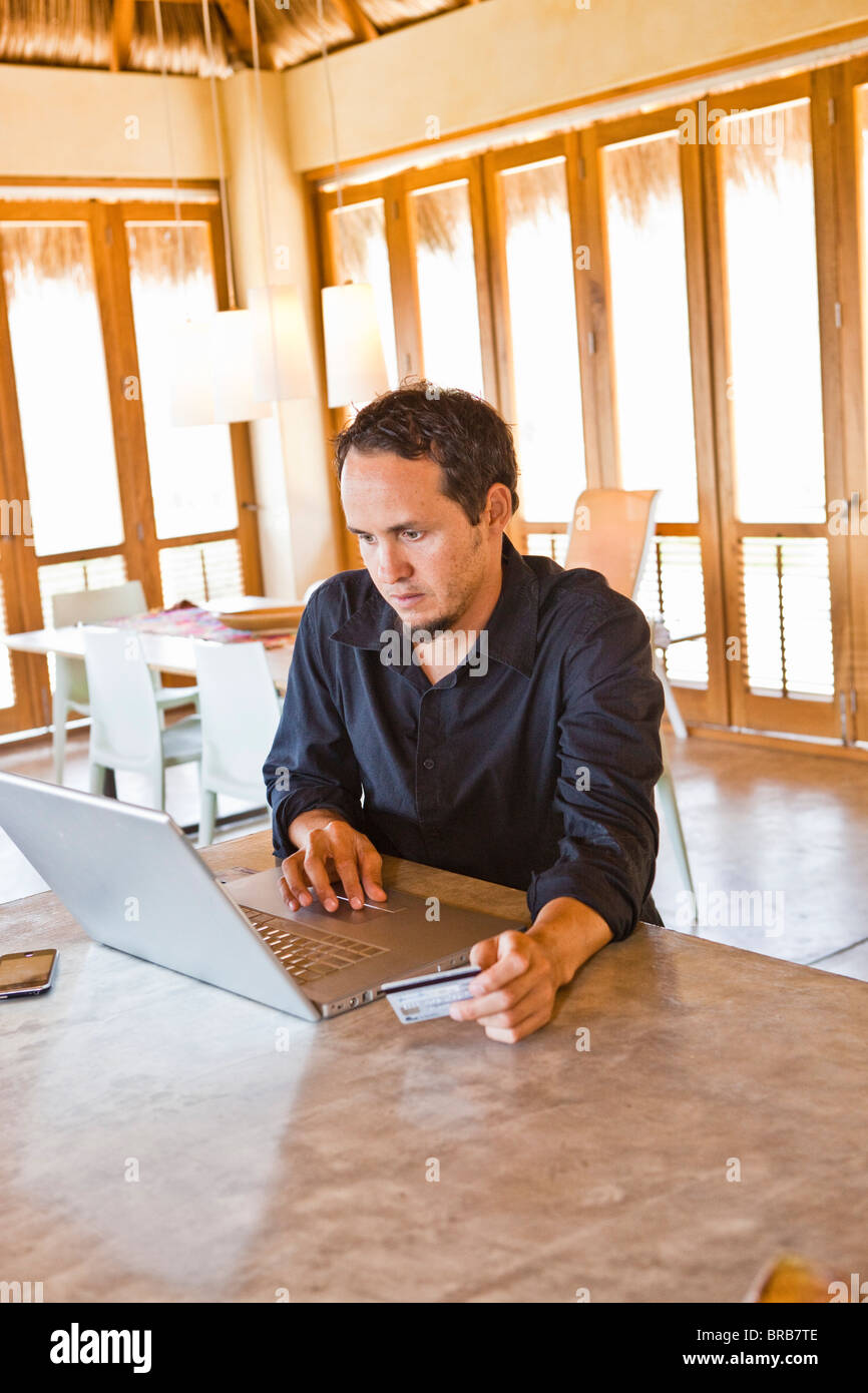 man working on laptop at home Stock Photo - Alamy