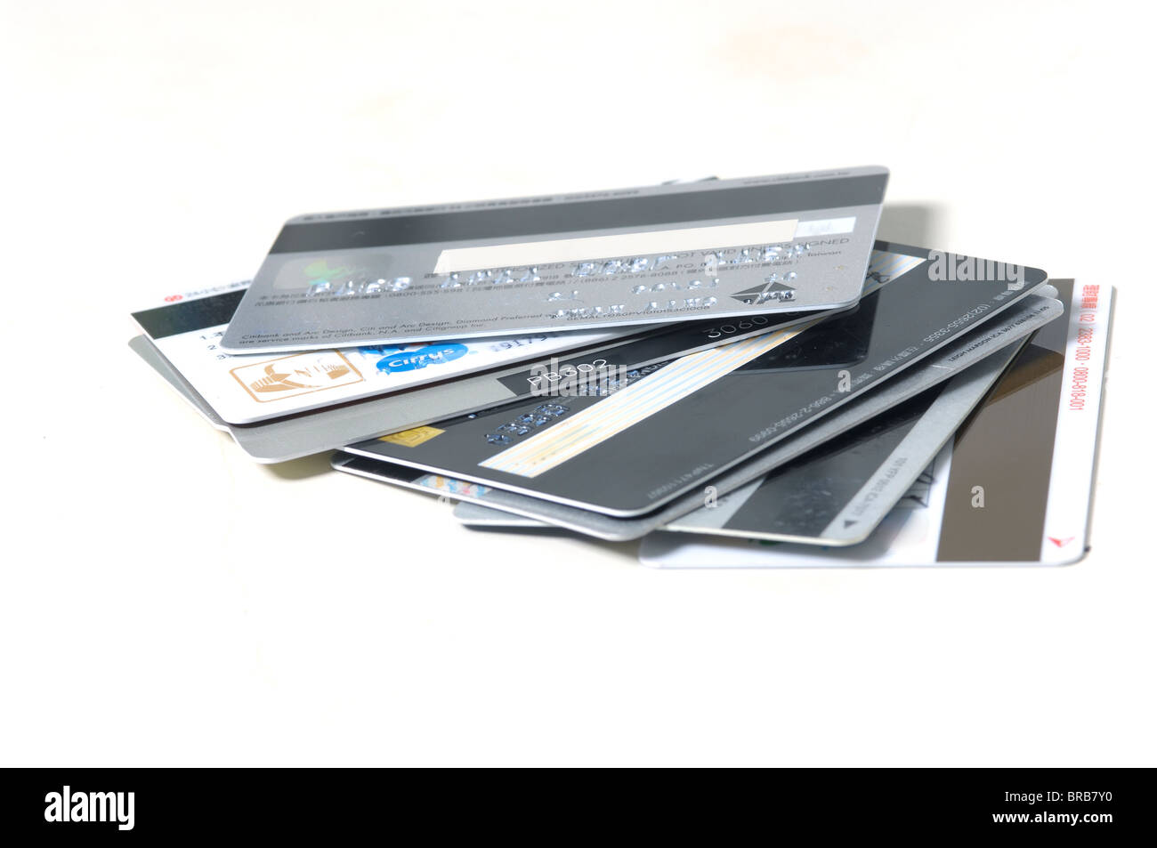 Credit cards against white background Stock Photo - Alamy