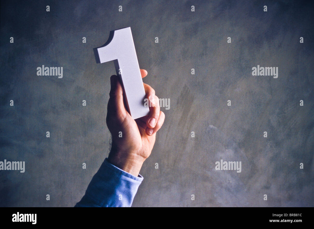 One male hand, finger number one, signifying first, best, winner ...