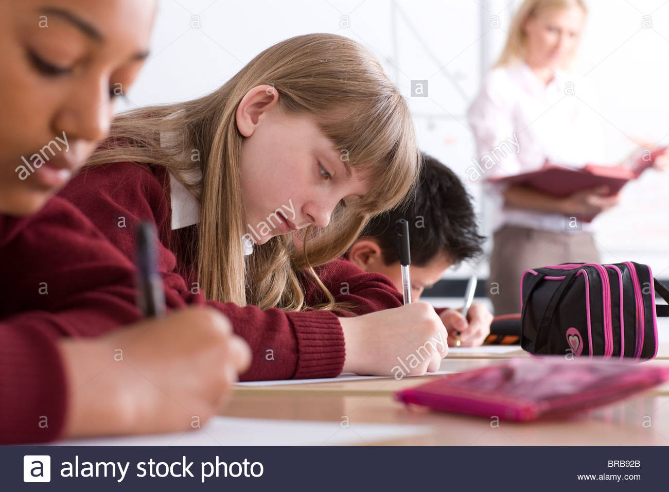 Students Writing Exam Uniform Stock Photos & Students Writing Exam ...