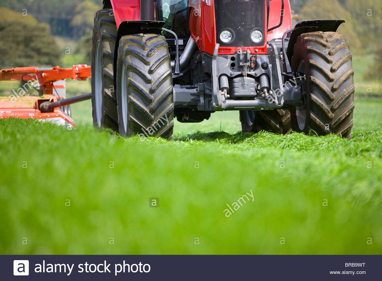 Field Tractor Harvesting Stock Photos & Field Tractor Harvesting Stock ...