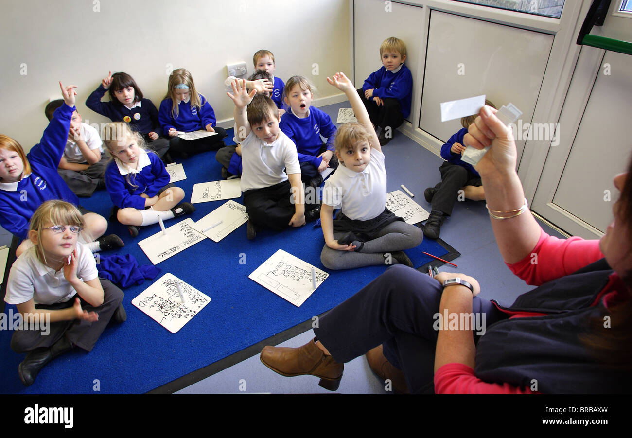 Phonics reading classes at a primary school in Devon, UK Stock Photo ...