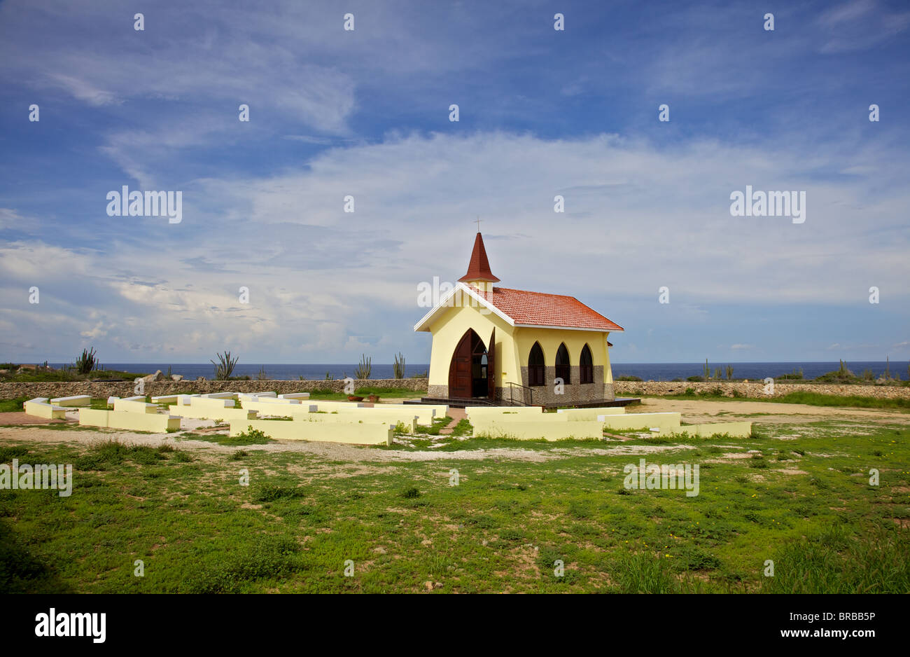 Alto Vista Chapel. A bright yellow small Catholic chapel that stands on ...