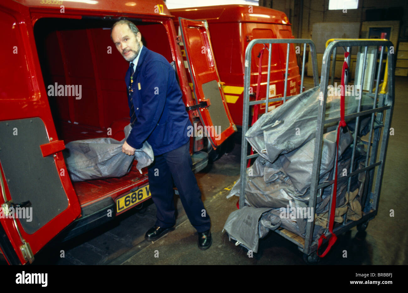 England East Sussex Brighton Mail Sorting Office Man Unloading Sacks Of ...