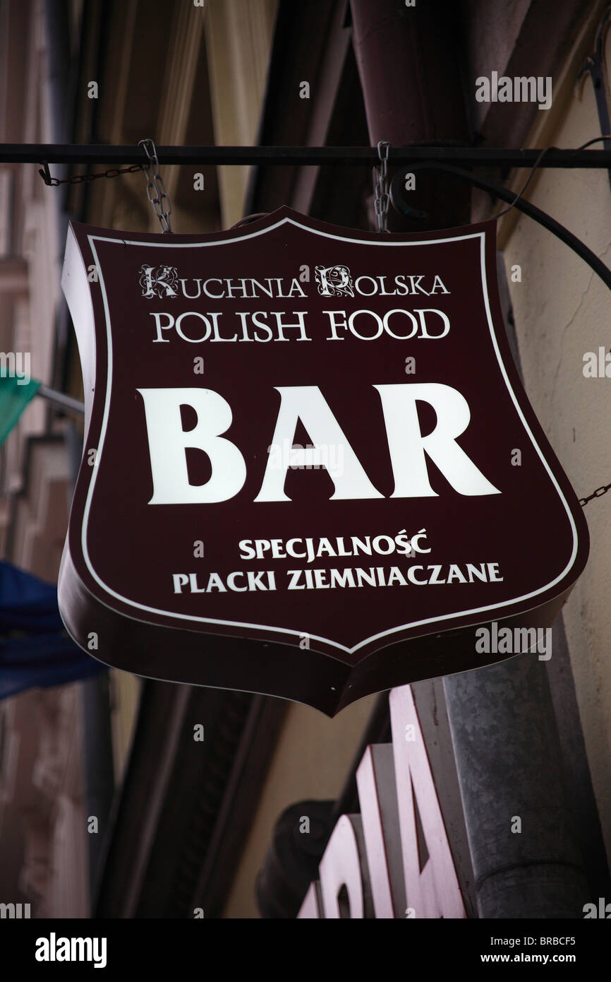 Poland krakow hanging sign for bar serving polish food hi-res stock ...