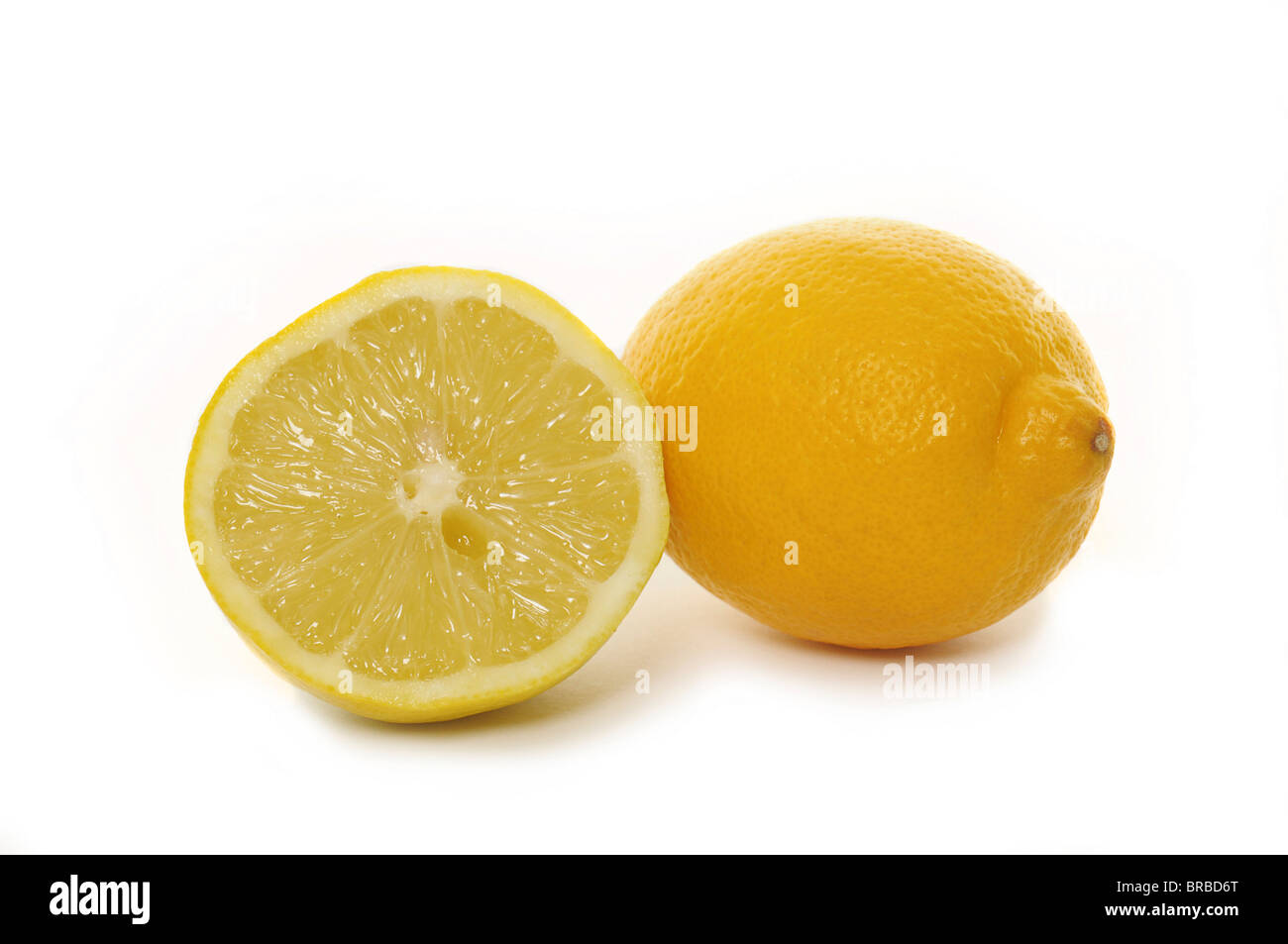 FOOD Fruits Lemons Whole fruit and half slice section through lemon ...