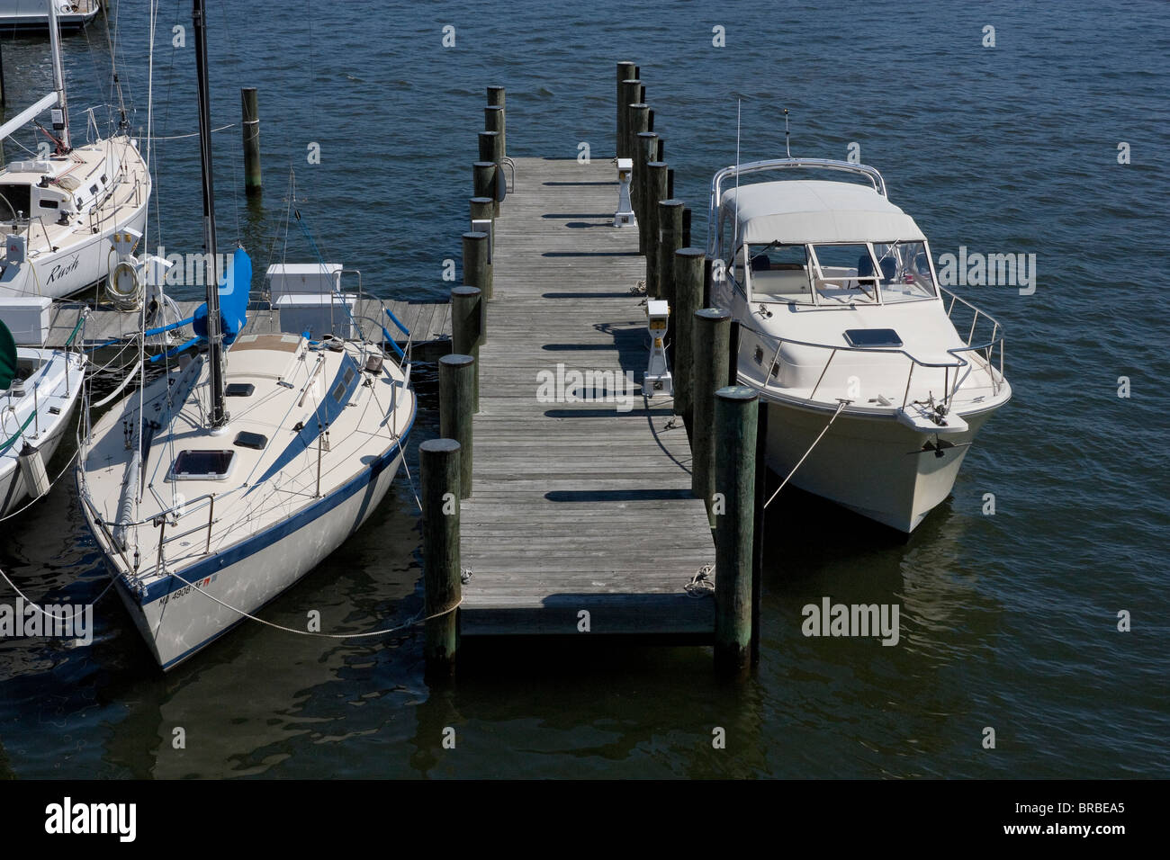 Yacht and Boat by Pier Stock Photo - Alamy