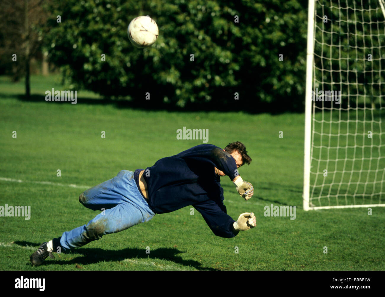 Dive for ball hi-res stock photography and images - Alamy