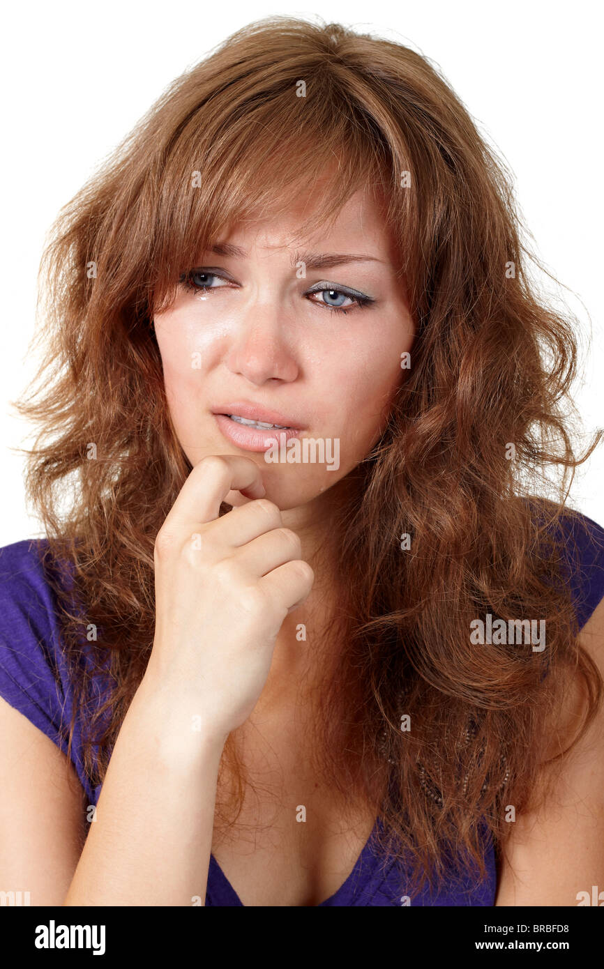 Beautiful girl crying isolated over white Stock Photo - Alamy