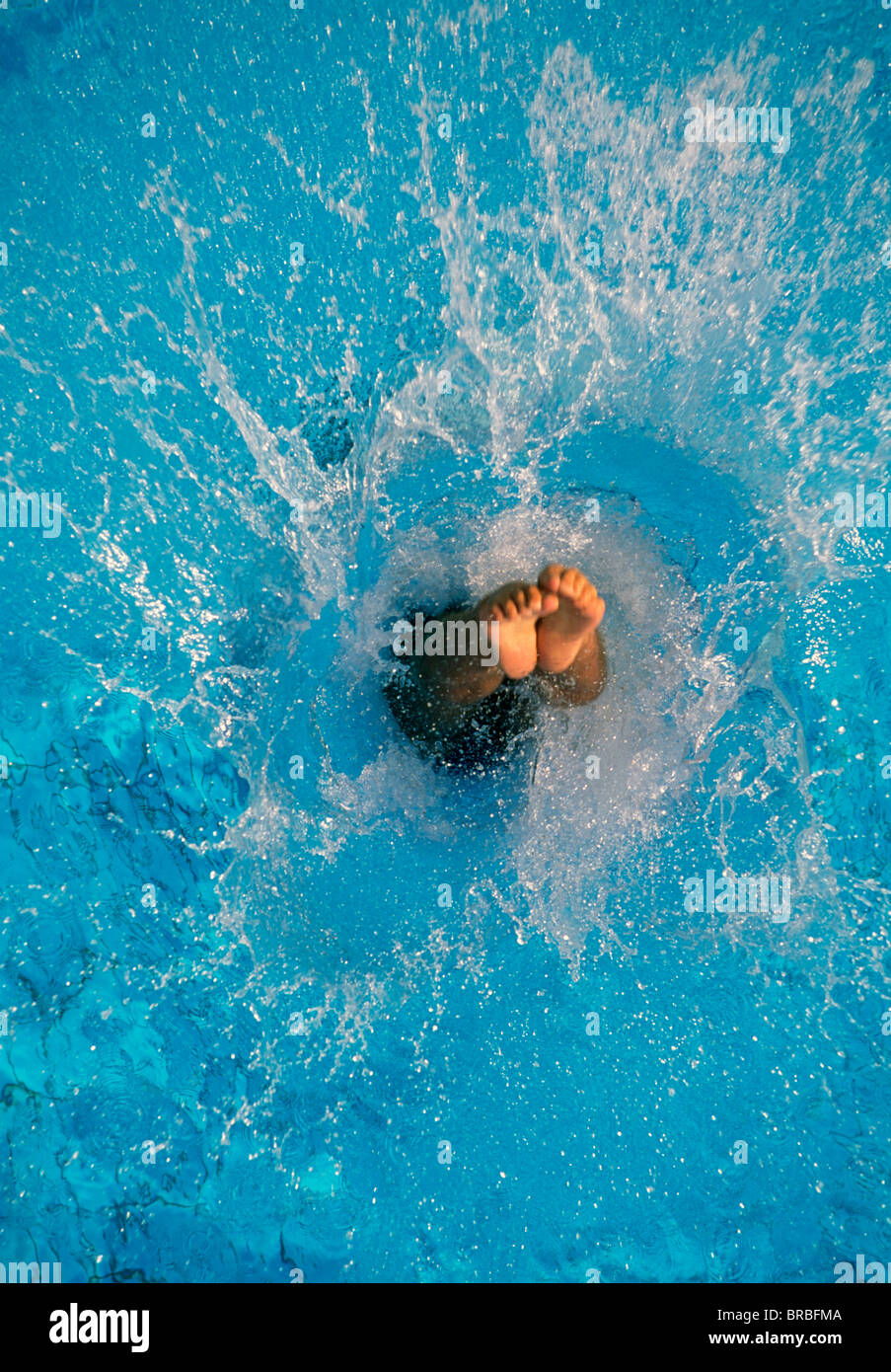 Person diving into pool Stock Photo - Alamy
