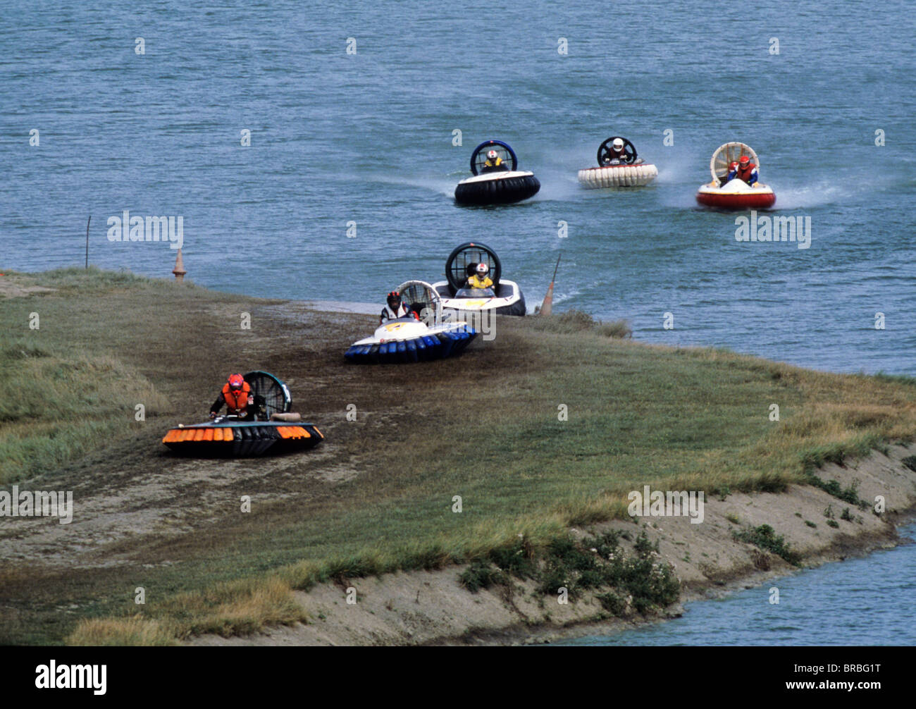Hovercrafts racing across the ground and lake Stock Photo - Alamy