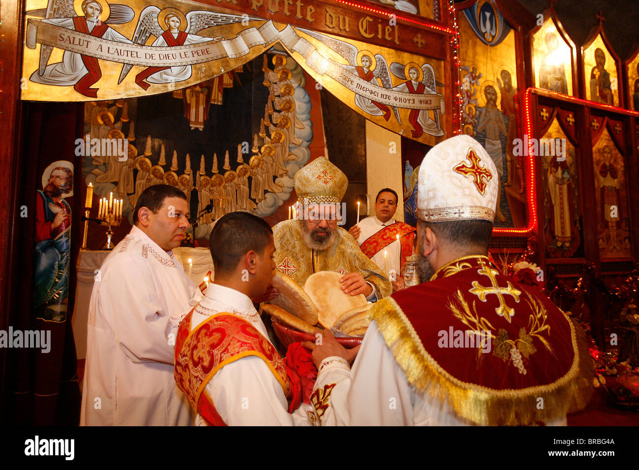 Blessing of the bread during Orthodox Coptic celebration, Chatenay ...