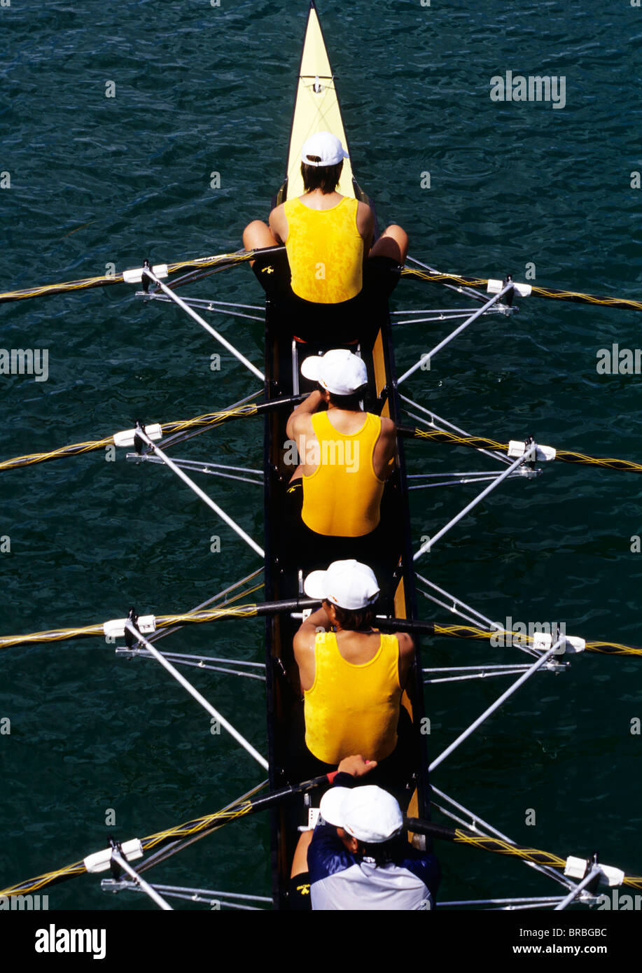 Rowing foursome gets ready for race Stock Photo - Alamy