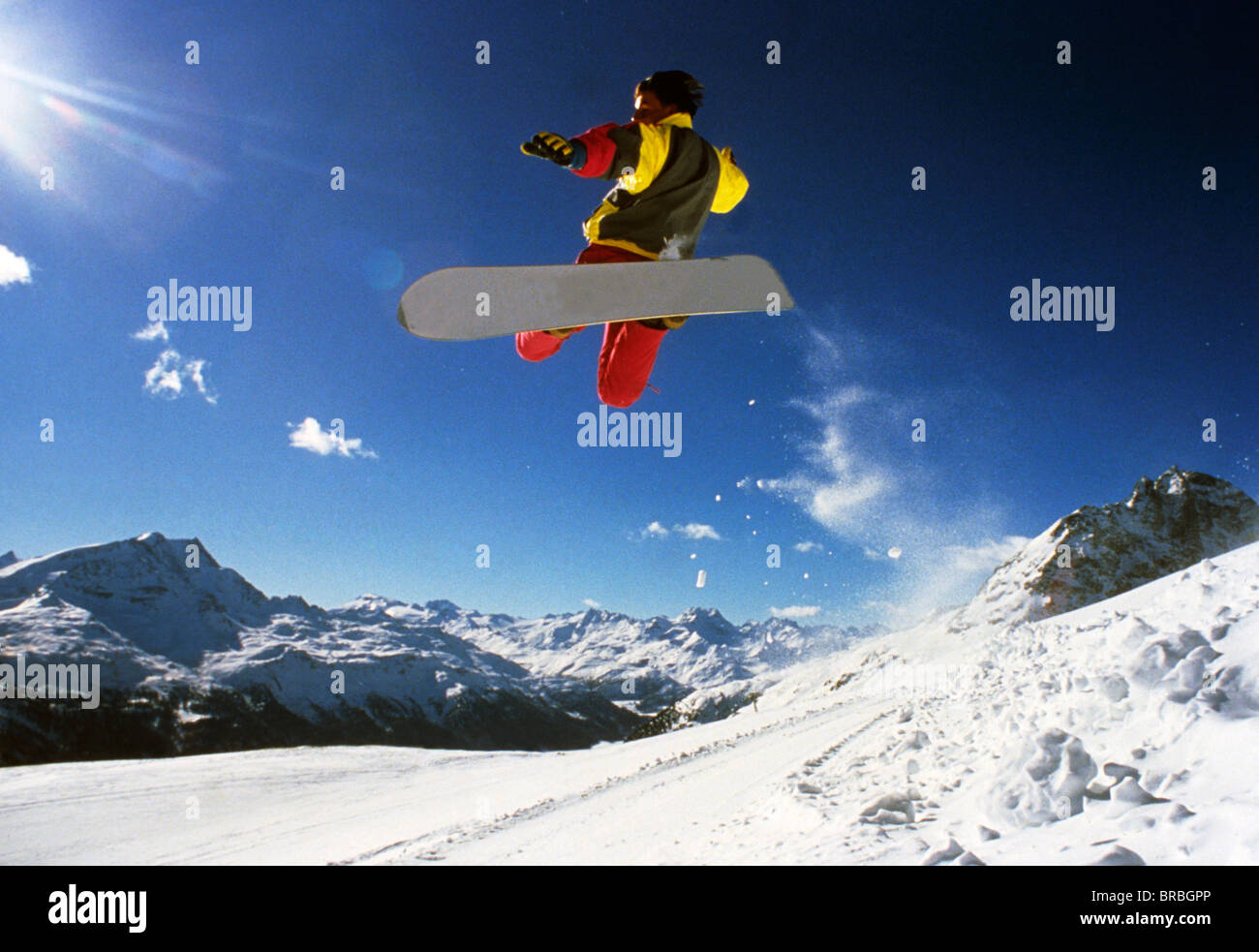 Man snow boarding Stock Photo - Alamy