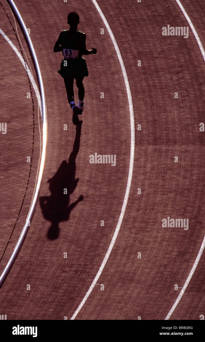 Runner on a track Stock Photo - Alamy