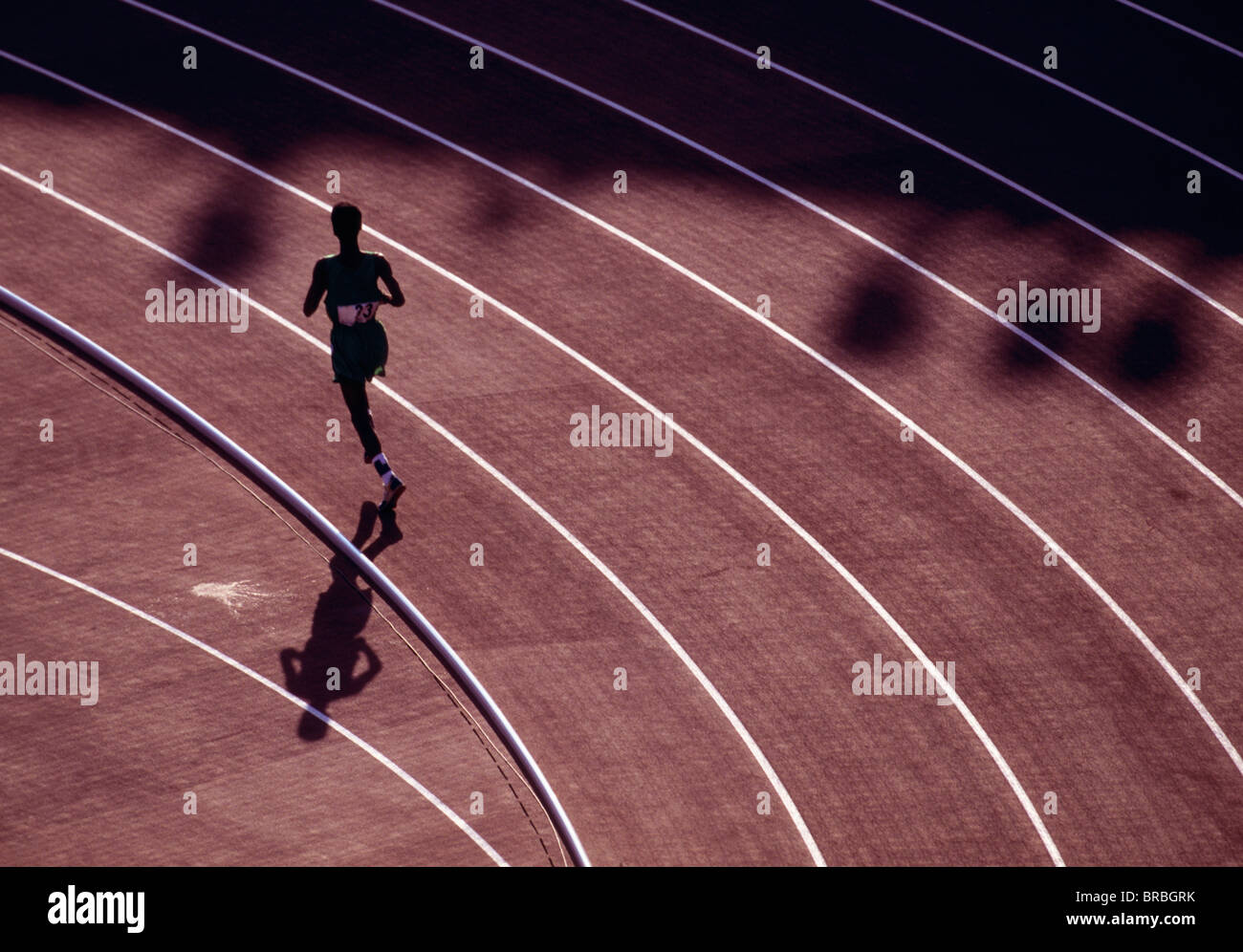 Runner on a track Stock Photo - Alamy