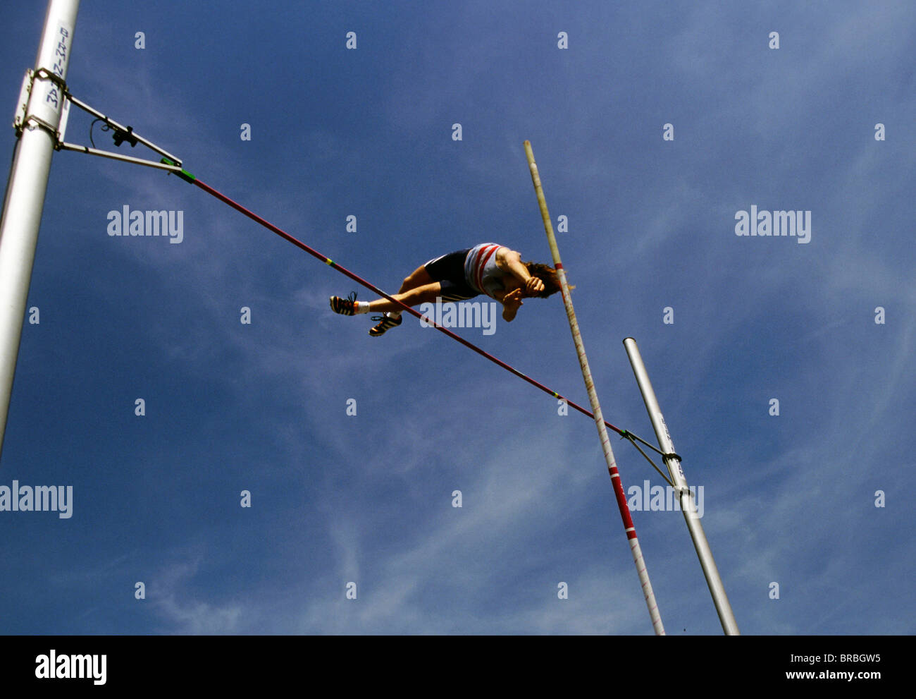 Pole vaulter clears the bar Stock Photo - Alamy