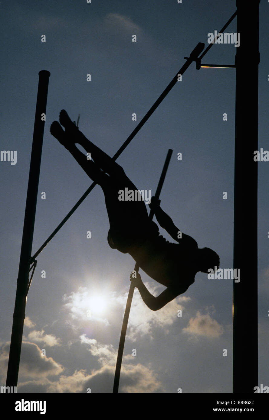 Silhouette man pole vaulting hi-res stock photography and images - Alamy