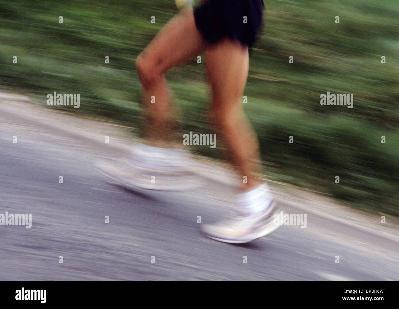 Runner in action Stock Photo - Alamy