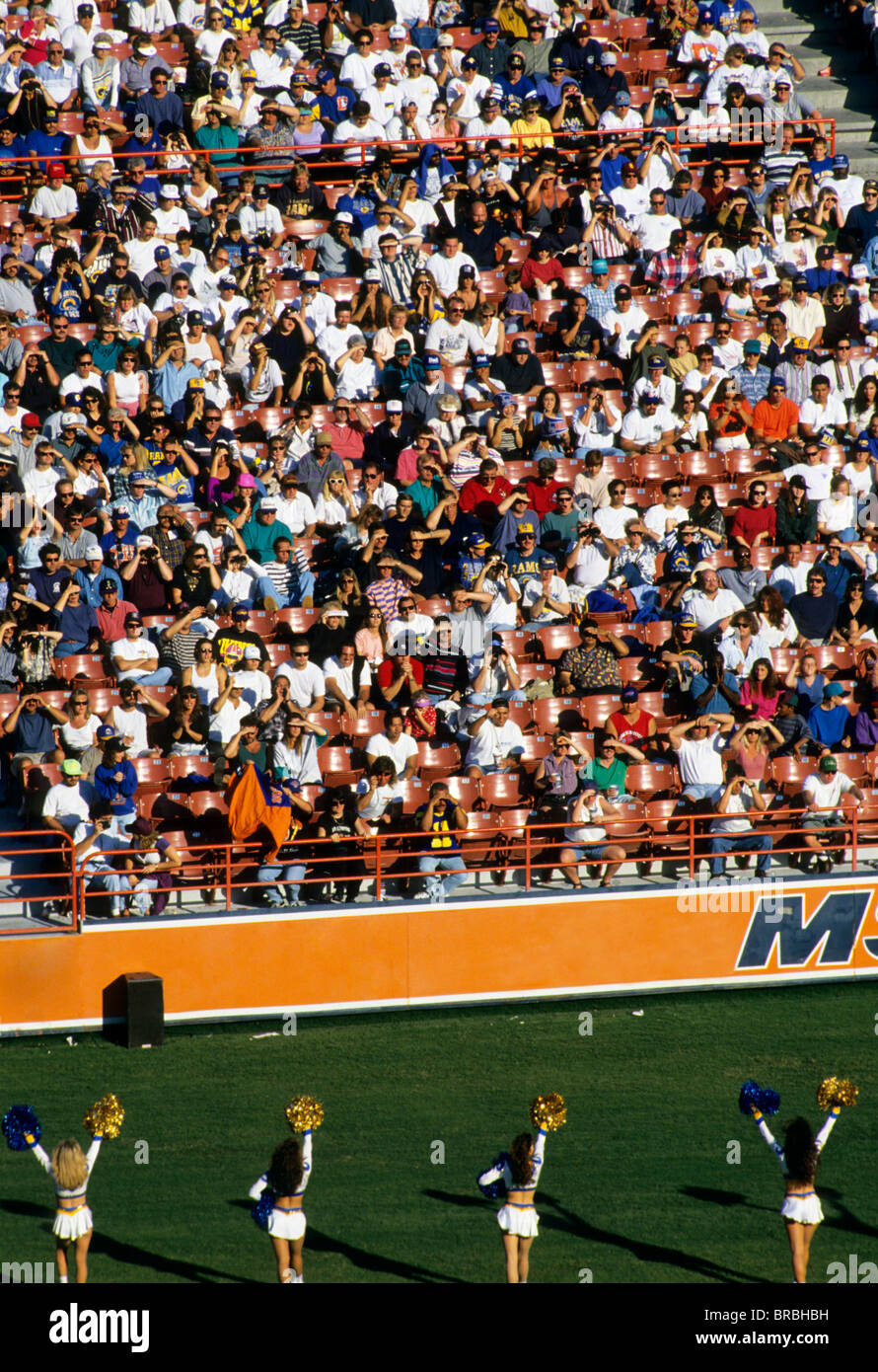 Cheerleaders perform in front of packed stands Stock Photo - Alamy
