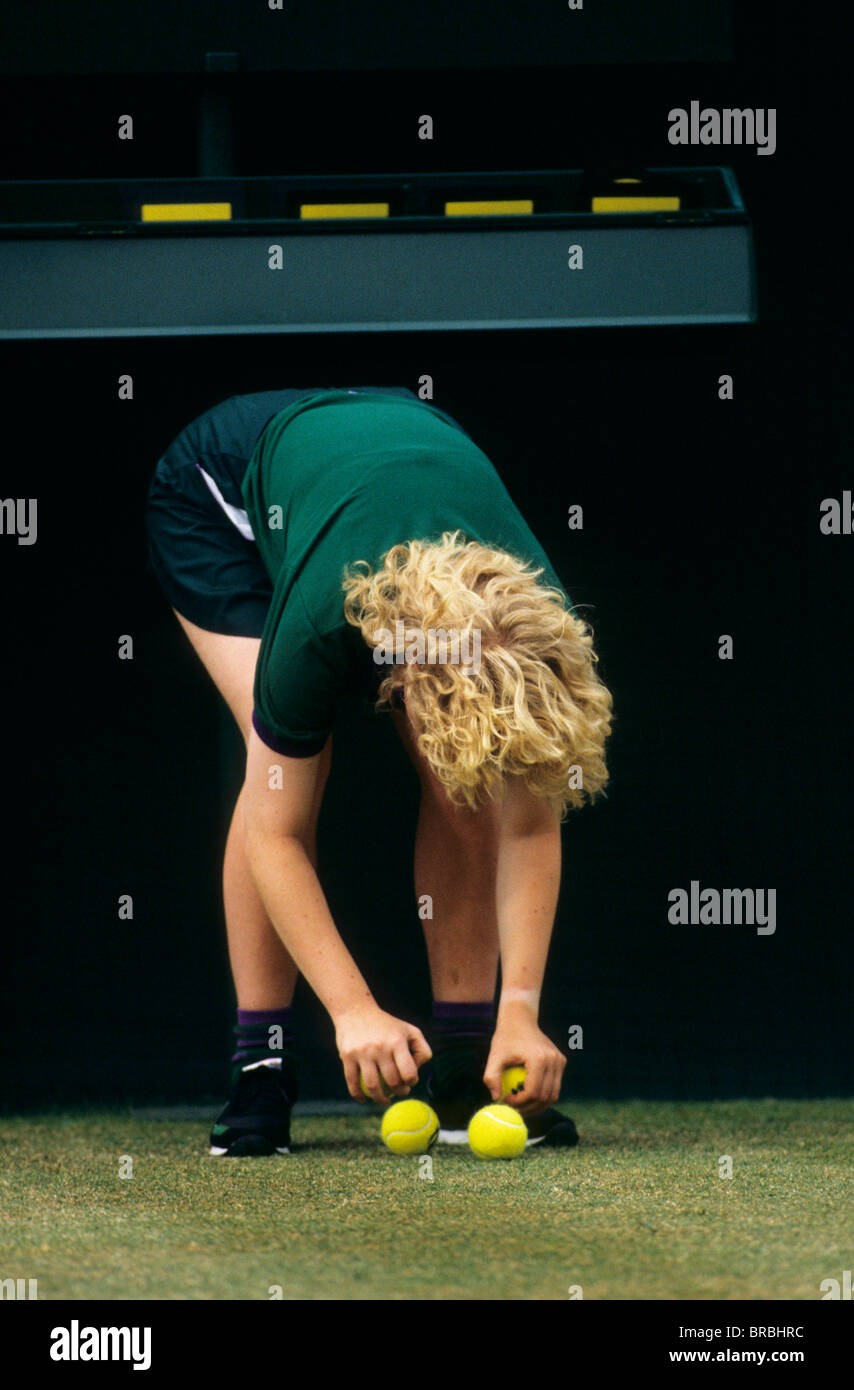 Girl stooping hi-res stock photography and images - Alamy