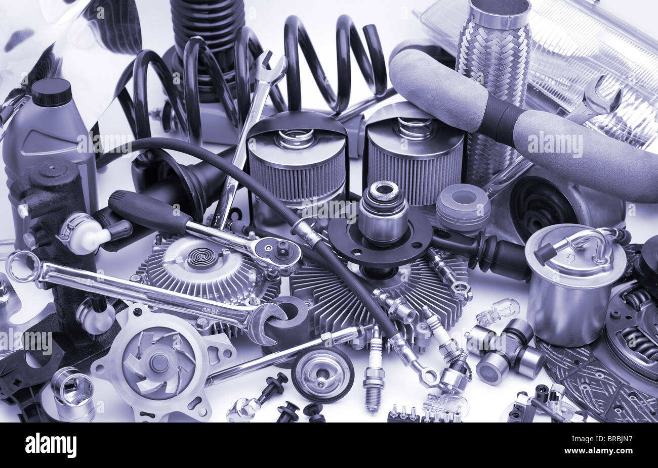 a lot of different auto spare parts, blue toning Stock Photo - Alamy