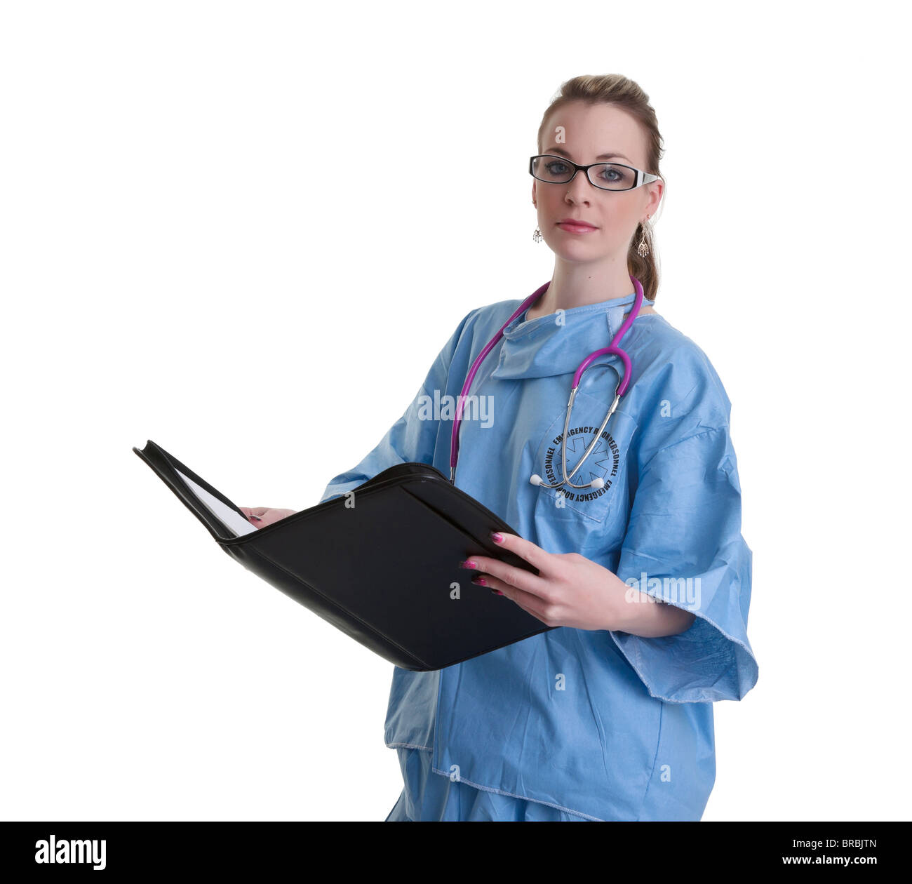 Pretty surgeon in blue scrubs presenting on white background Stock ...