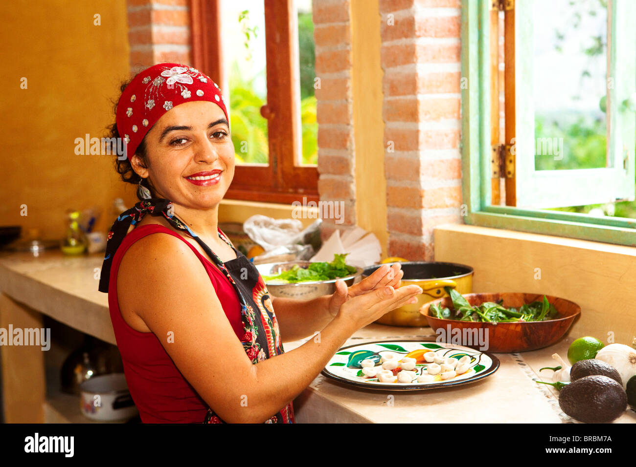 woman preparing food in kitchen Stock Photo - Alamy