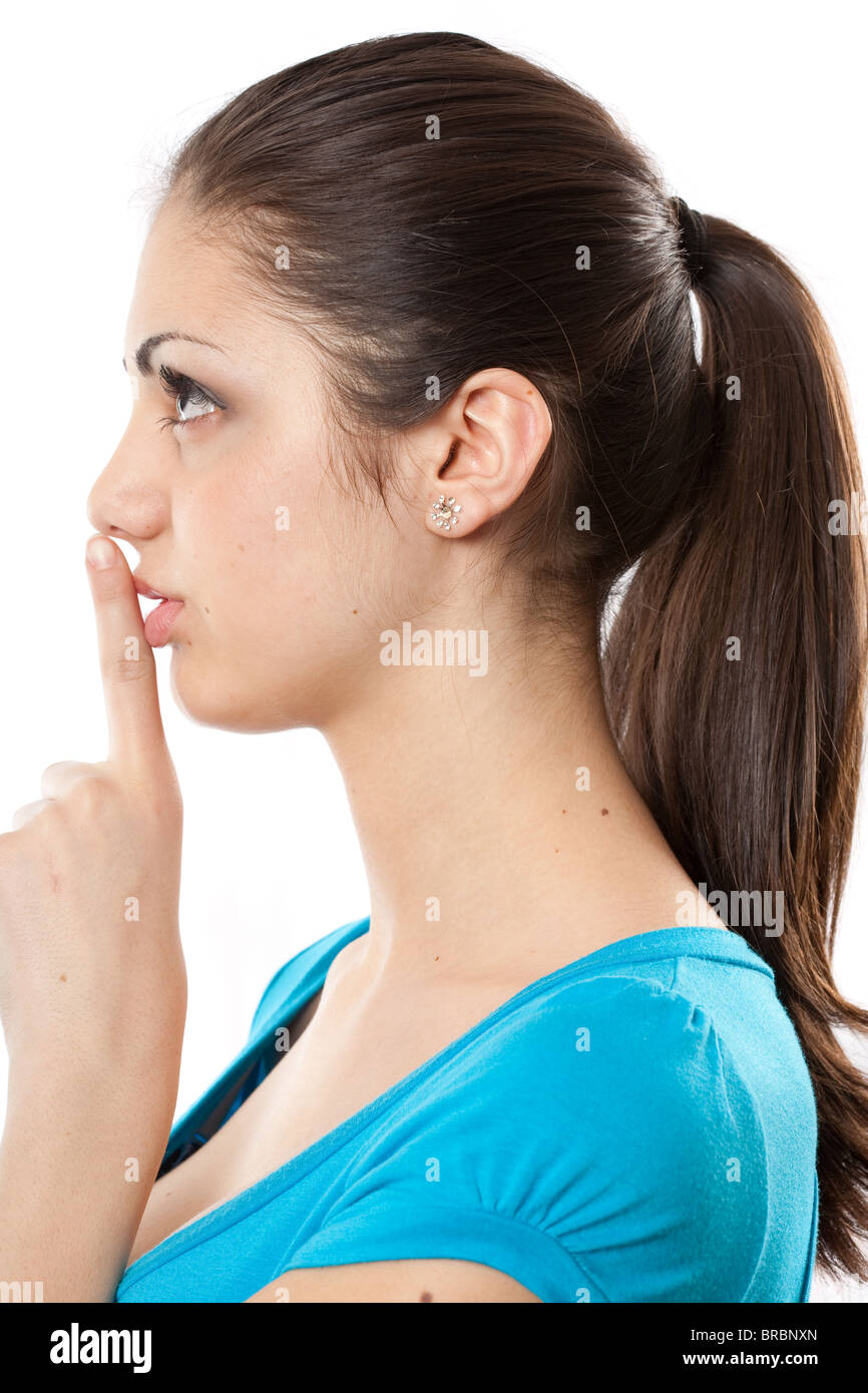 Closeup portrait of a young woman making silence sign Stock Photo - Alamy
