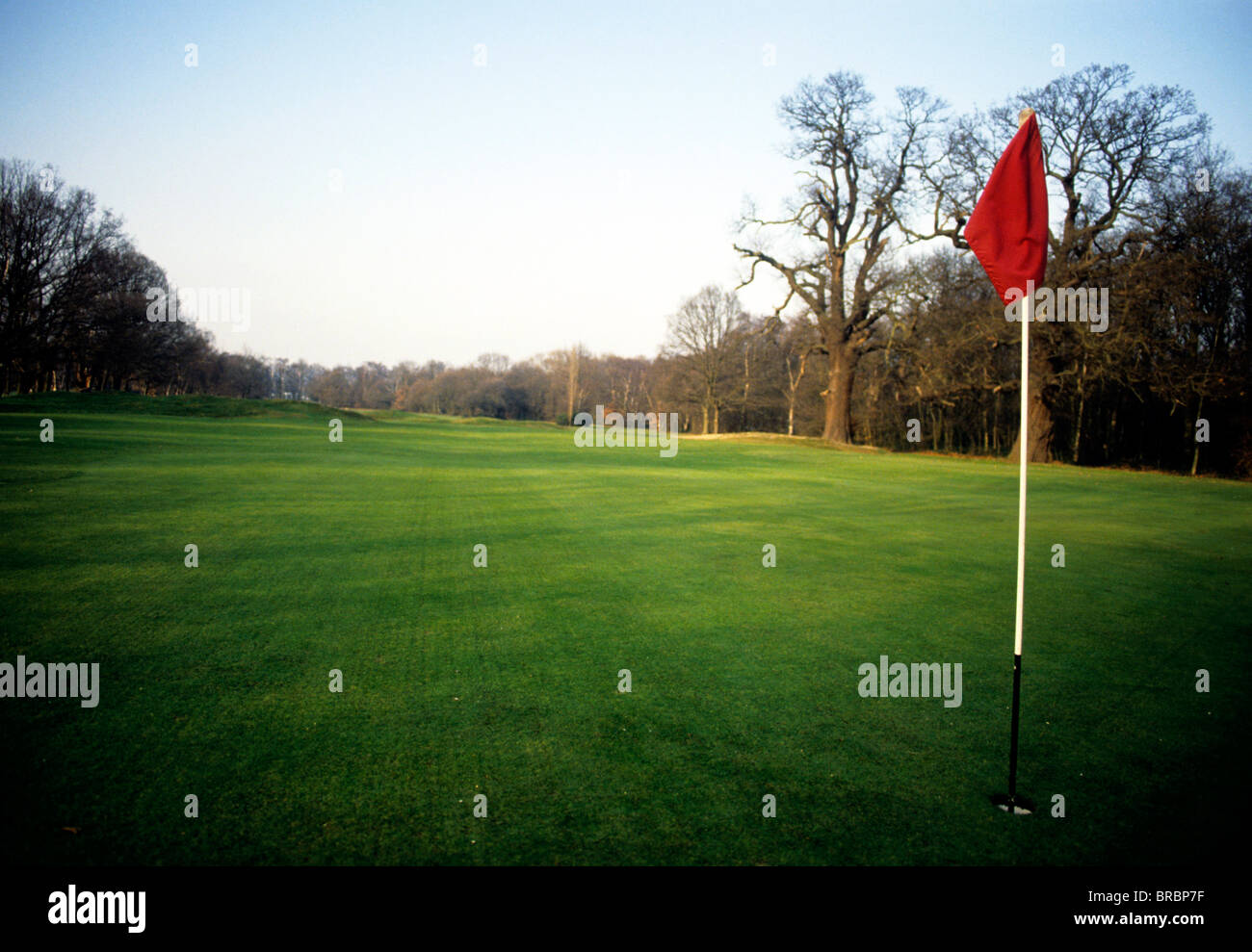 Looking back down the fairway from green on golf course Stock Photo - Alamy