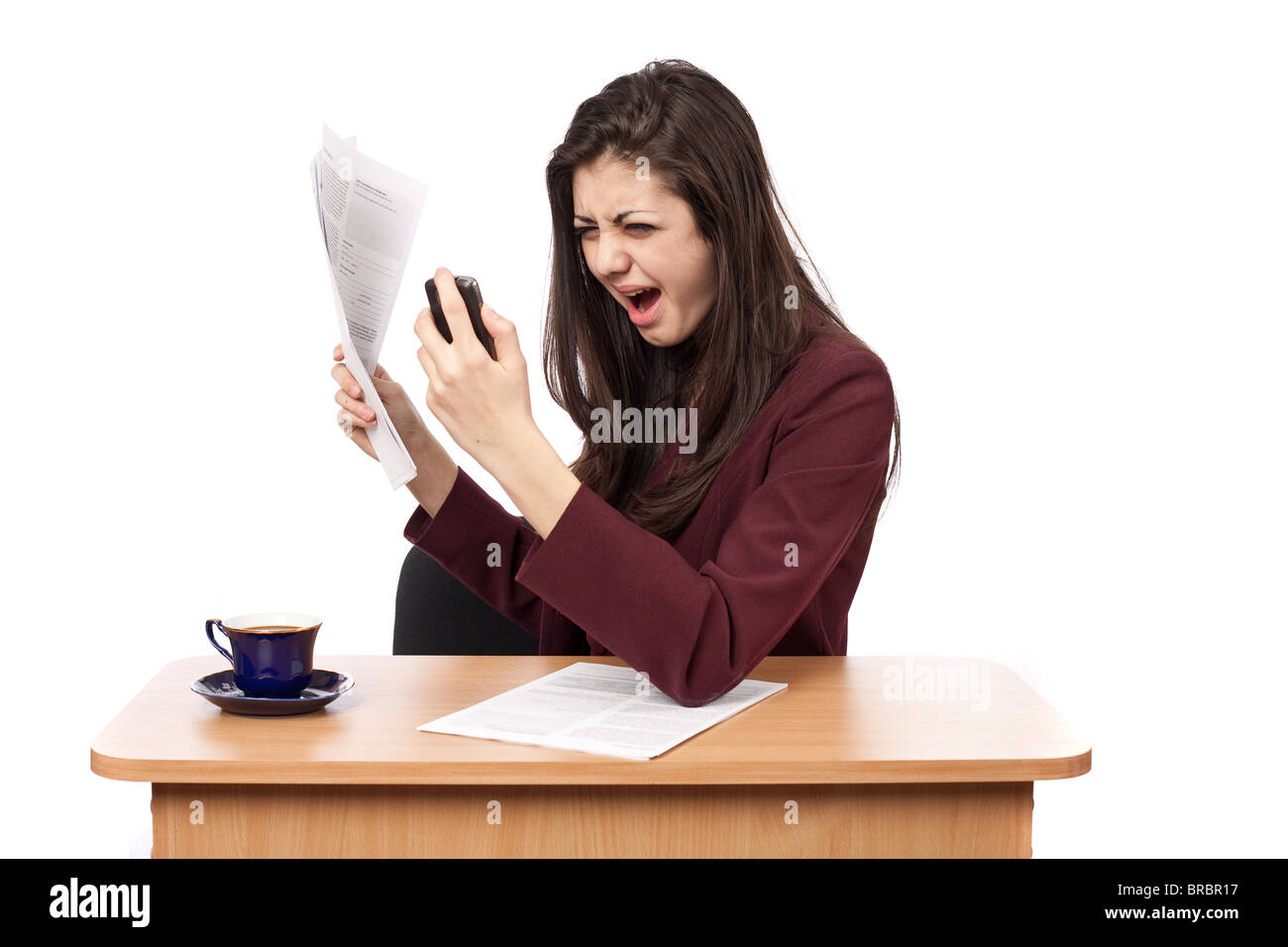 Angry young business lady shouting on phone Stock Photo - Alamy