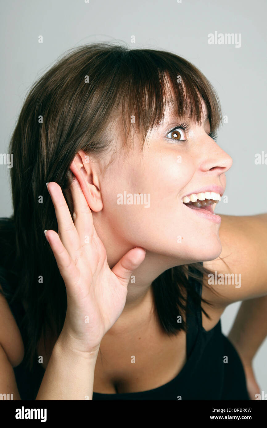 Woman straining to hear hi-res stock photography and images - Alamy