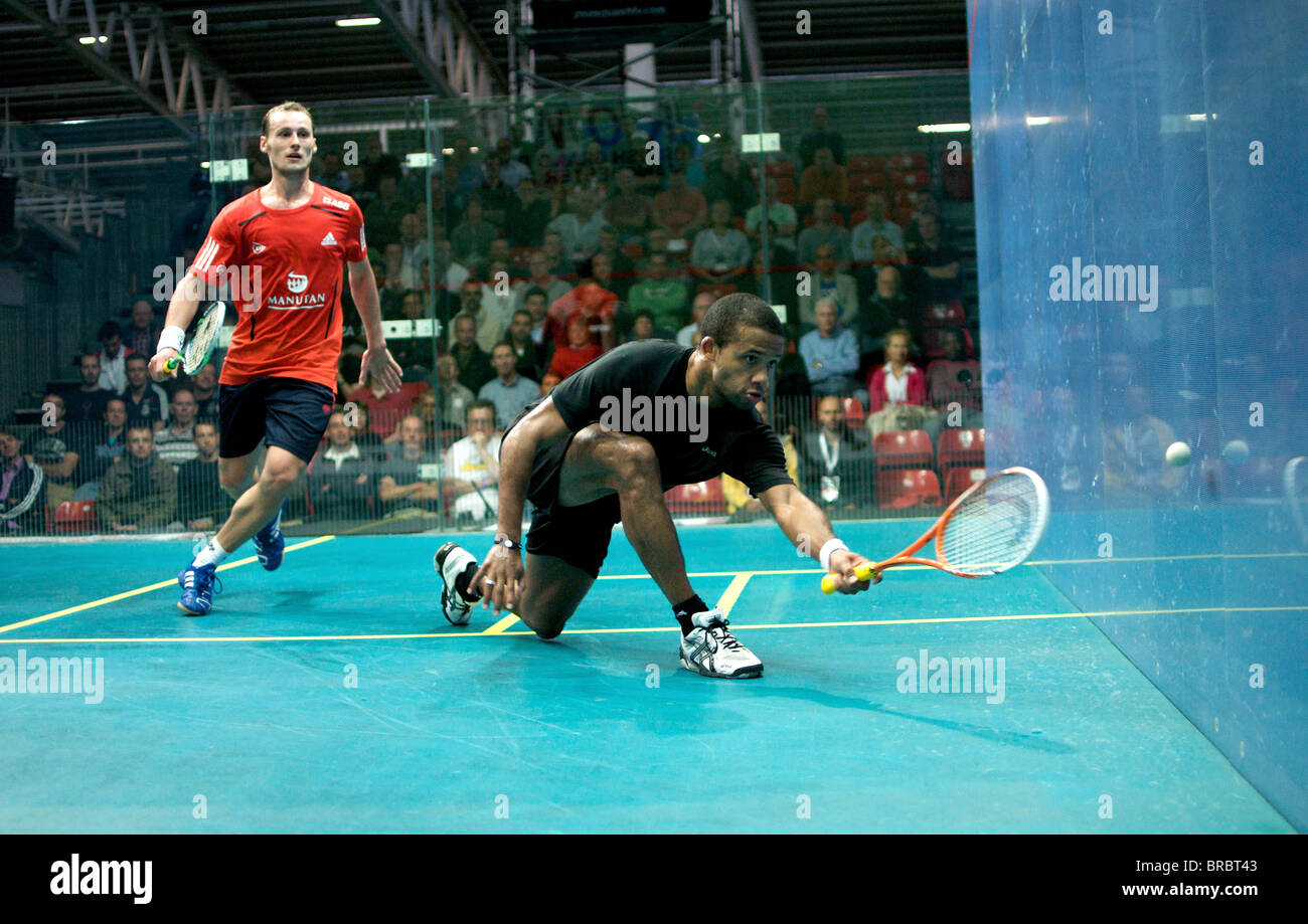 adrian grant plays a shot in his match against gregory gaultier at the ...