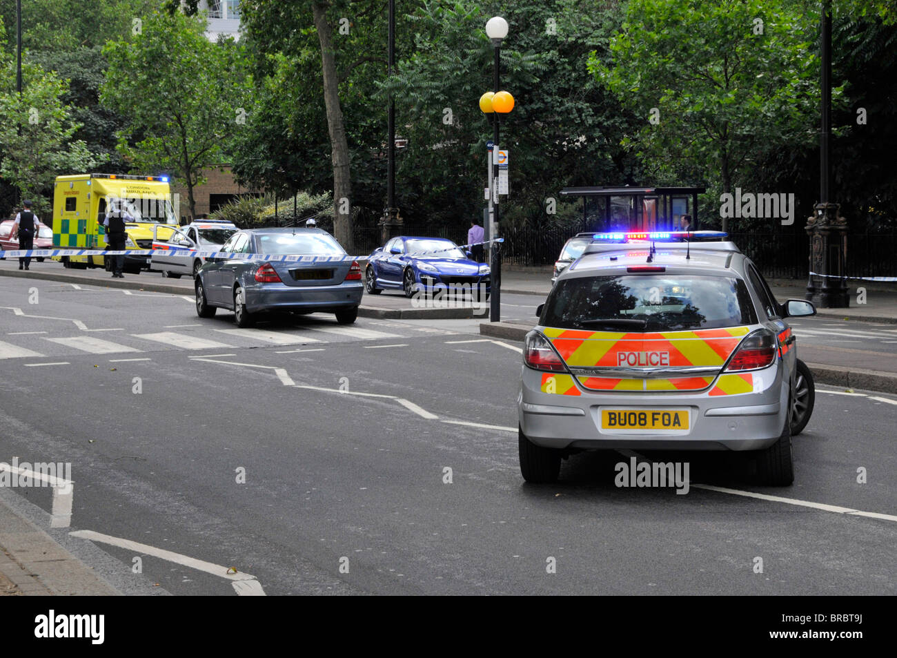 Ambulance and Police car attending road traffic accident Stock Photo ...