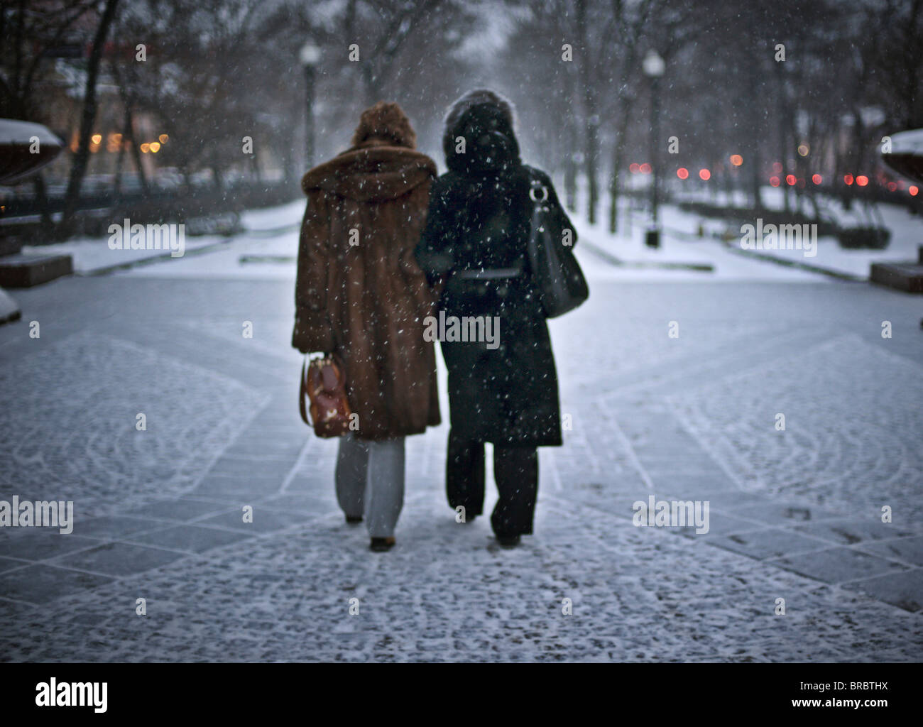 Two women in the snow, Moscow, Russia Stock Photo - Alamy