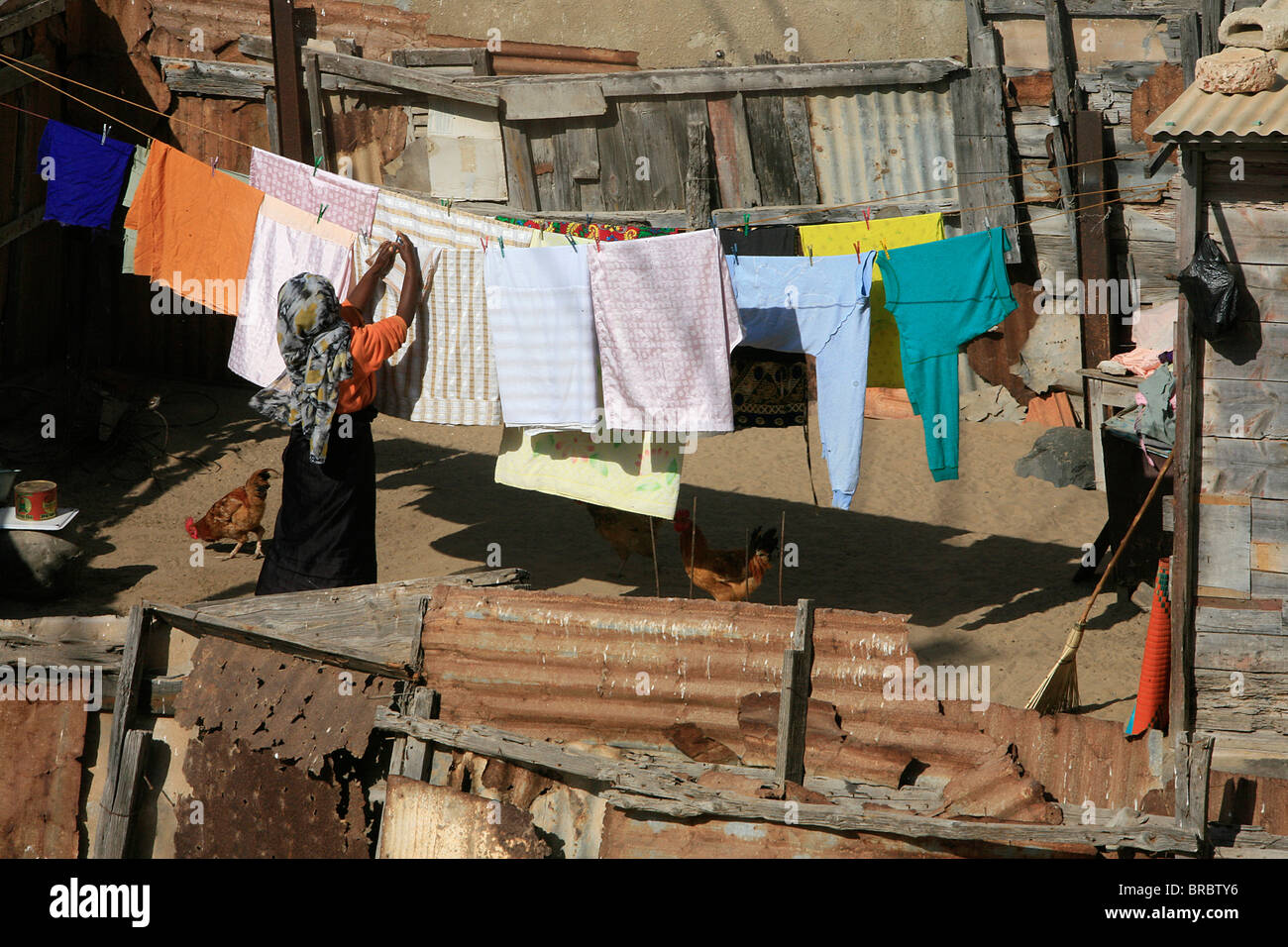 Woman drying laundry, St. Louis, Senegal, West Africa Stock Photo - Alamy