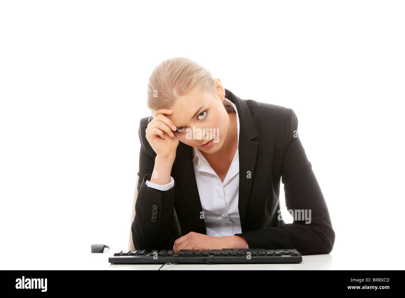 Bored businesswoman working on pc, isolated on white background Stock ...