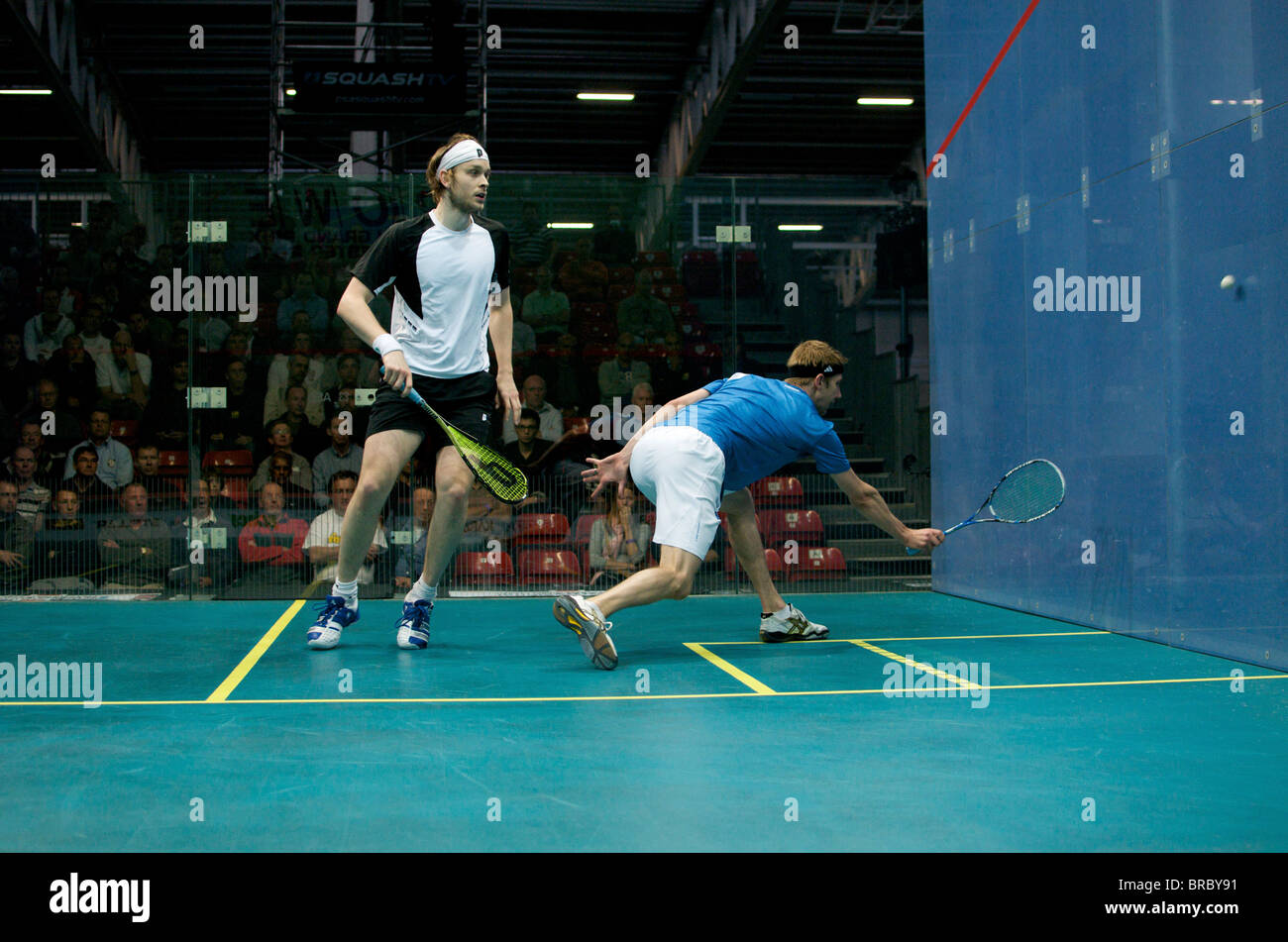 stewart bowman stretches to make a return in his match against james ...