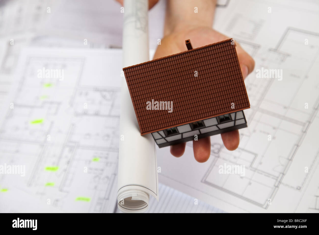 The house in human hands Stock Photo - Alamy