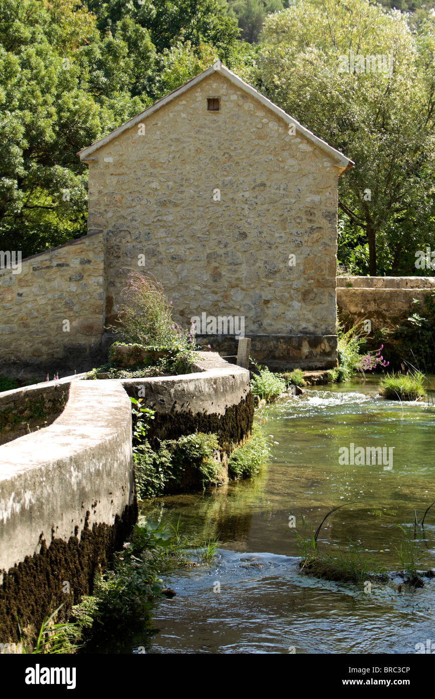 A stone building by a pond in the Krka national park in Croatia Stock ...