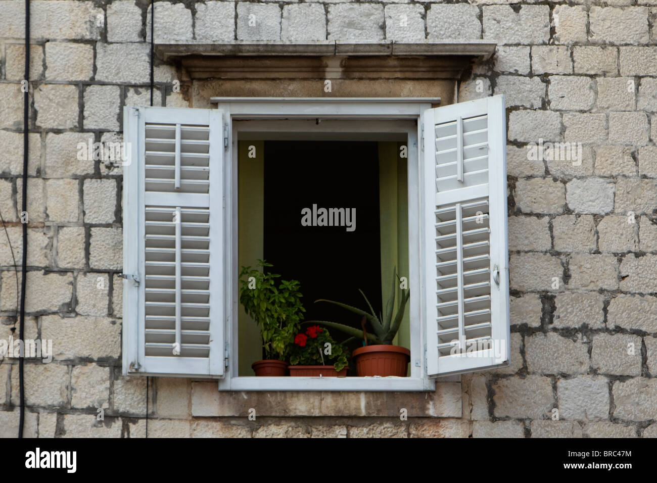 A wooden shuttered window Stock Photo - Alamy