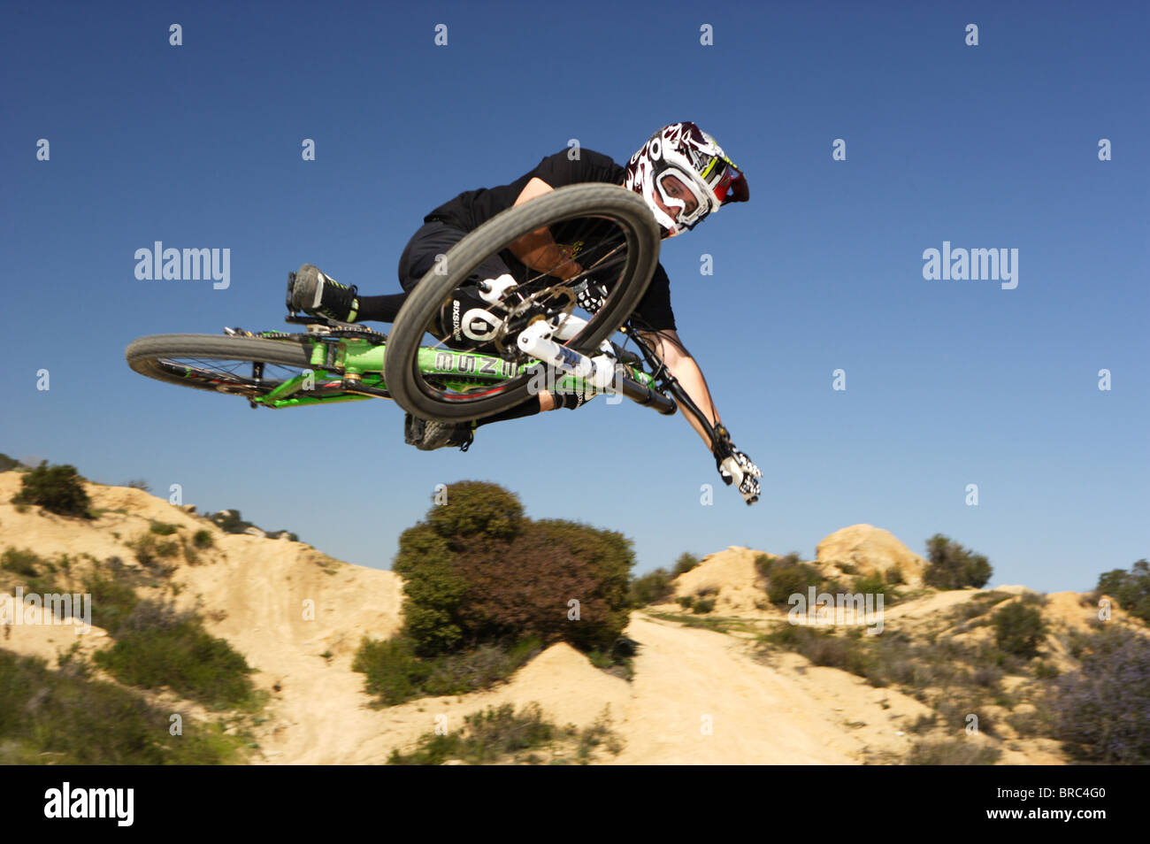 Freestyle Mountain Biker jumping Stock Photo - Alamy