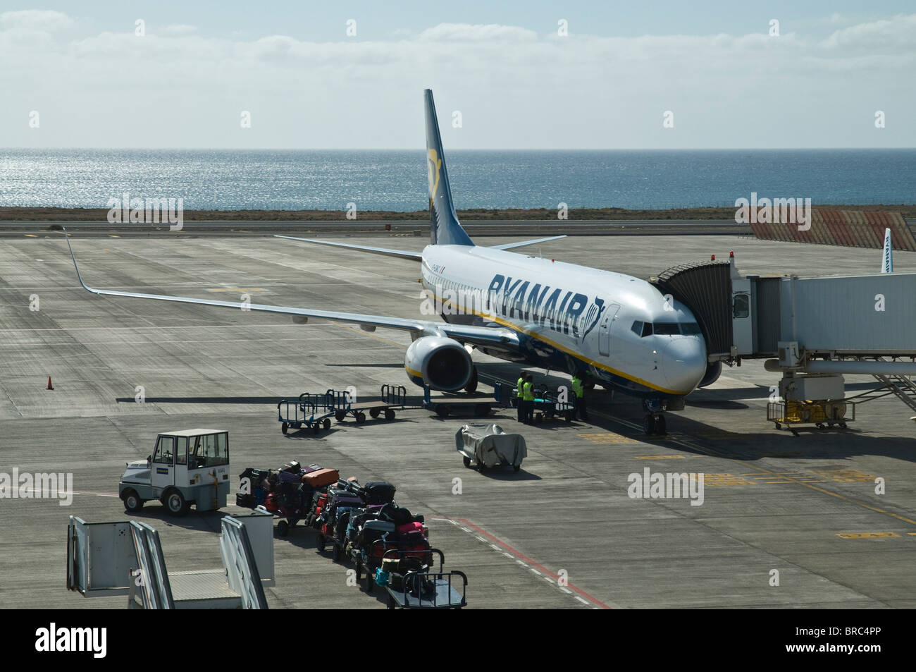 dh ARRECIFE AIRPORT LANZAROTE Ryanair airplane on runway loading ...